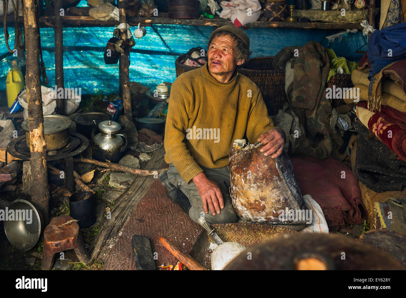 Man from Monpa tribe packs cheese in animal lining to barter, Dirang ...
