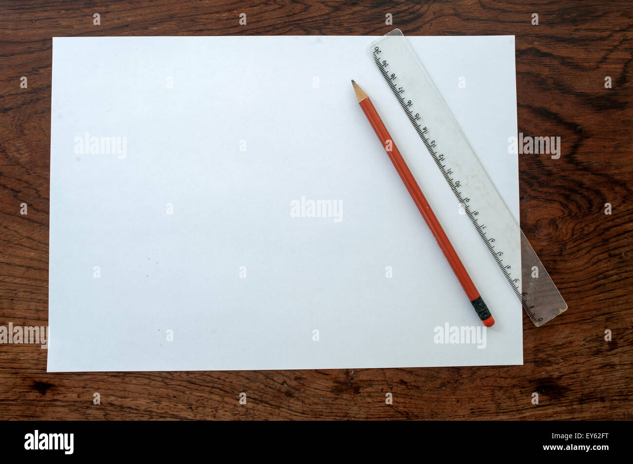 Paper, Pencil and Ruler inside a wood desk Stock Photo - Alamy