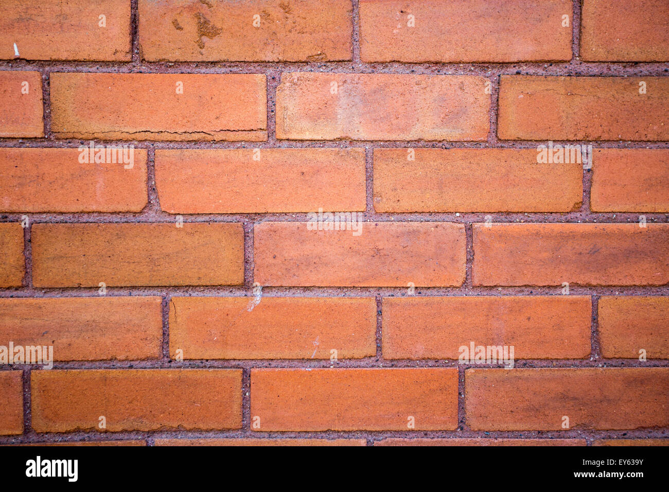 Brick wall background on building structure Stock Photo - Alamy