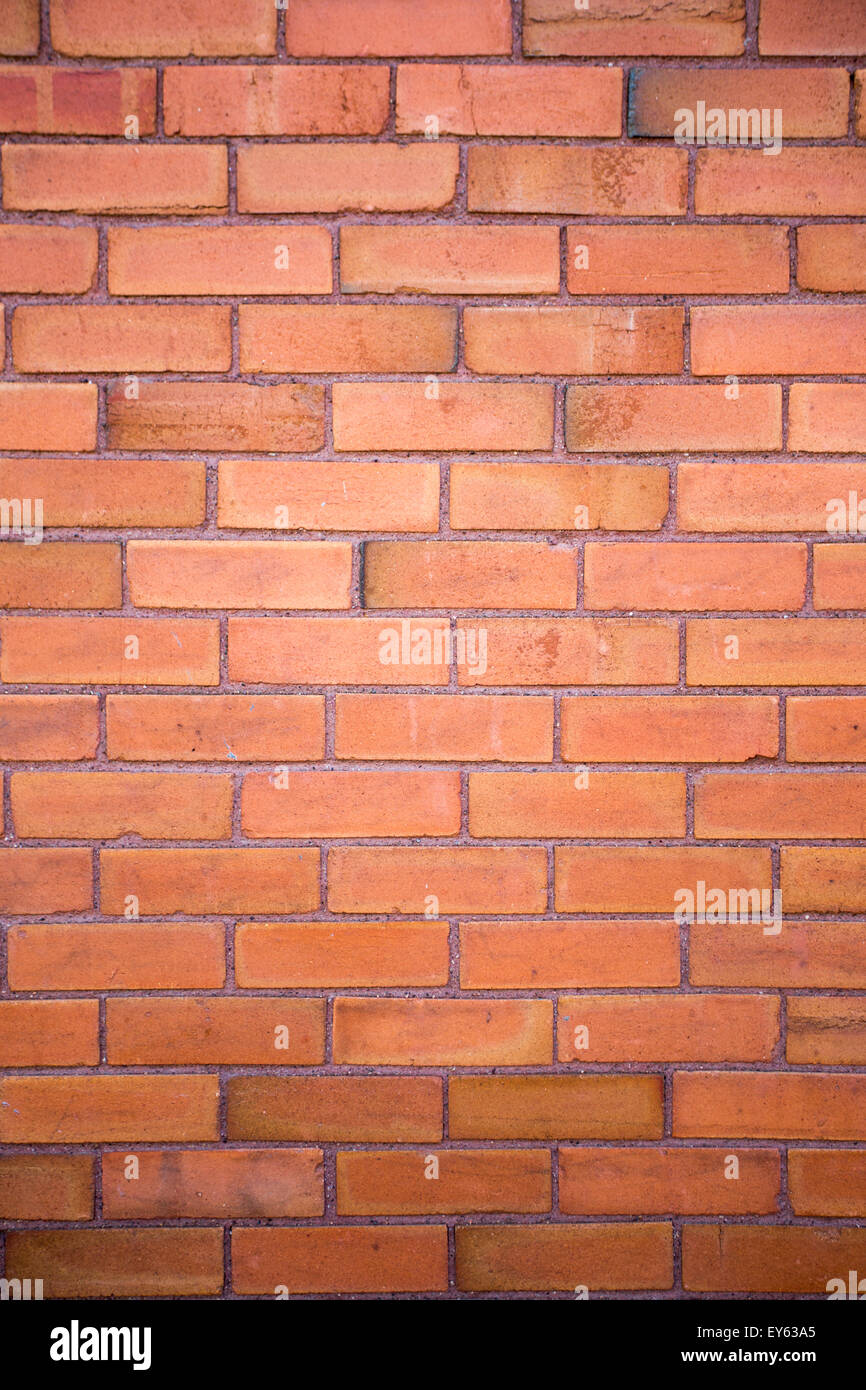 Brick wall background on building structure Stock Photo - Alamy