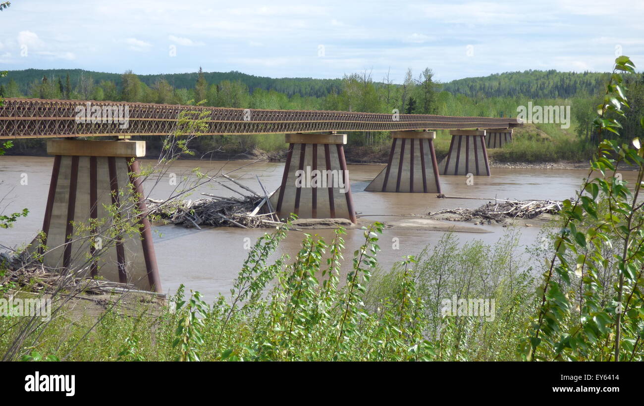 Narrow, single lane, wooden decked bridge over the Nelson River in ...