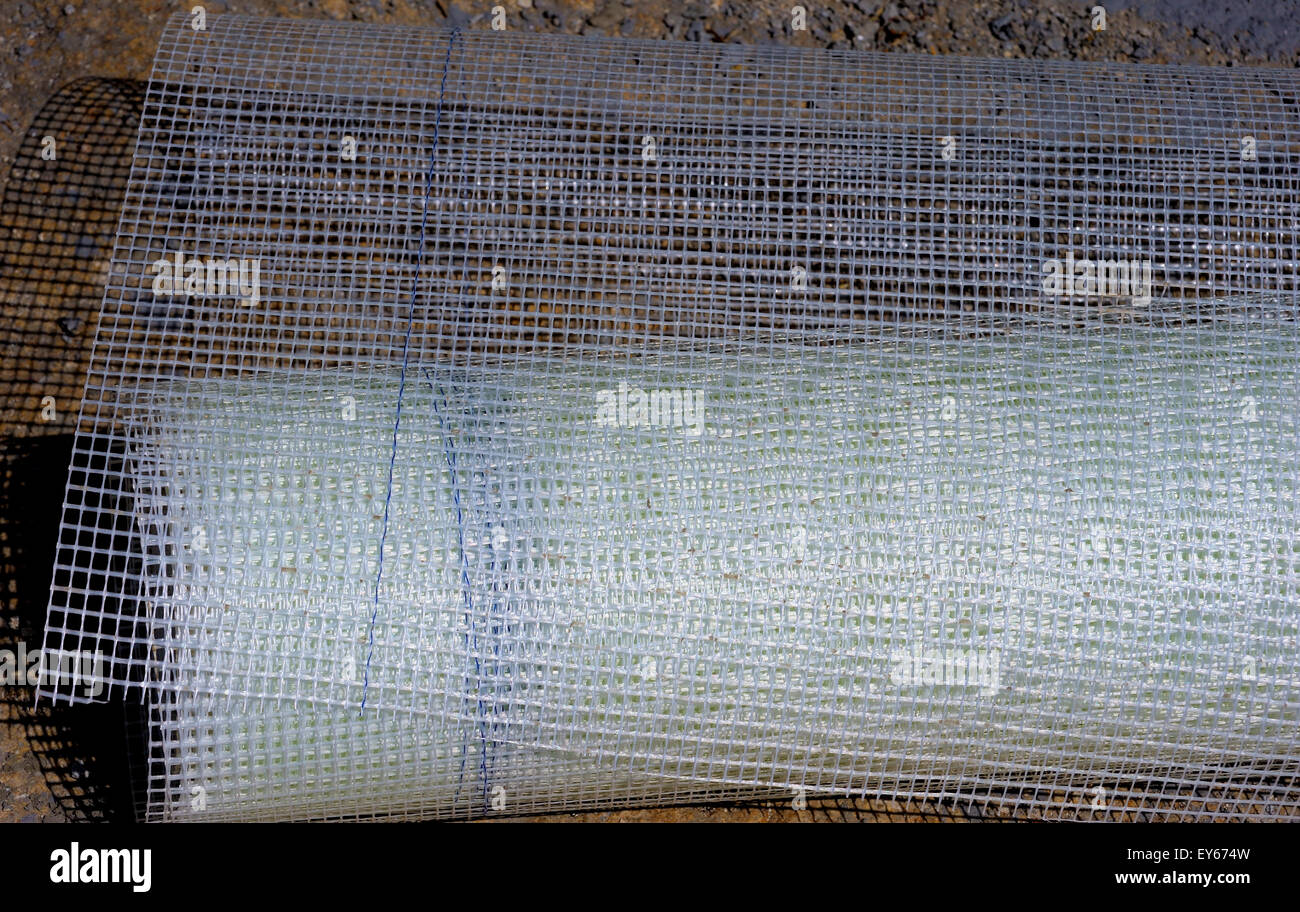 roll plastic grid for plaster isolated on construction site Stock Photo ...