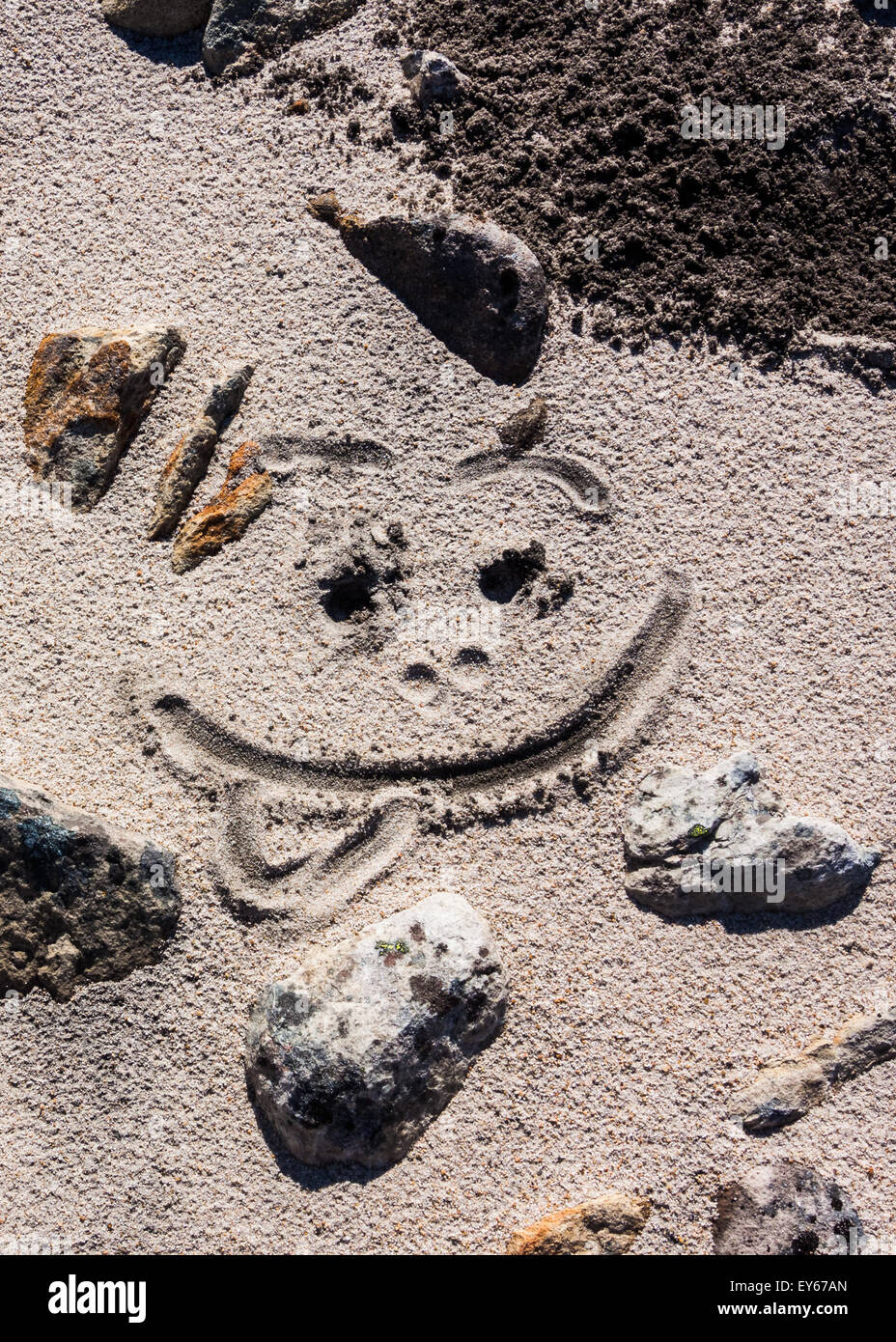 Smile in the sand Stock Photo - Alamy