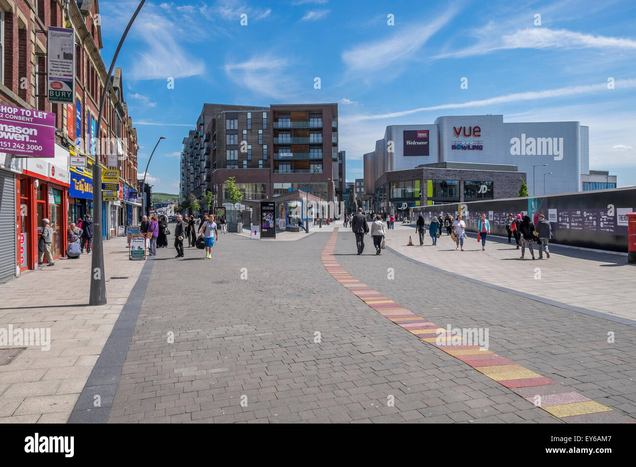 A pedestrianised street leading up to a shopping centre with no ...