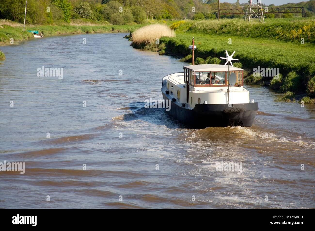 Dutch barge going down River Douglas, Lancashire having just left ...