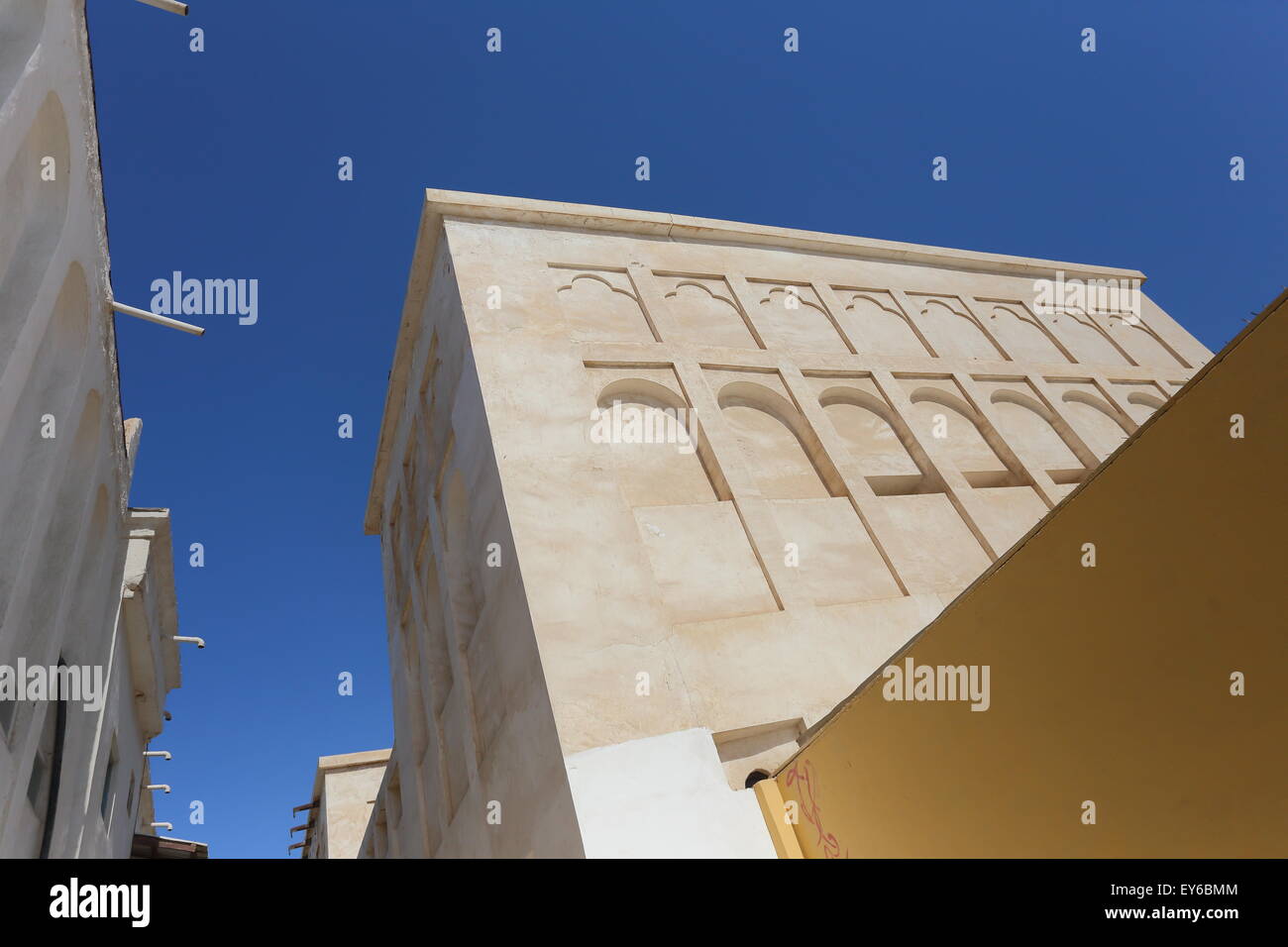 An alley and houses on the Pearl Trail in old Muharraq, Kingdom of ...