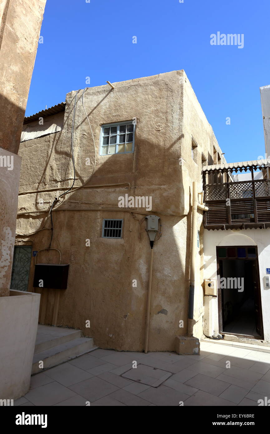 An alley and house on the Bahrain Pearling Trail in old Muharraq ...