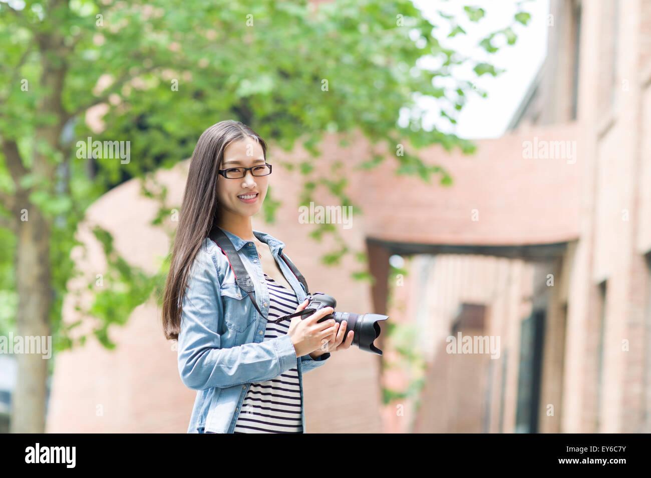 An indian women taking photos hi-res stock photography and images - Alamy