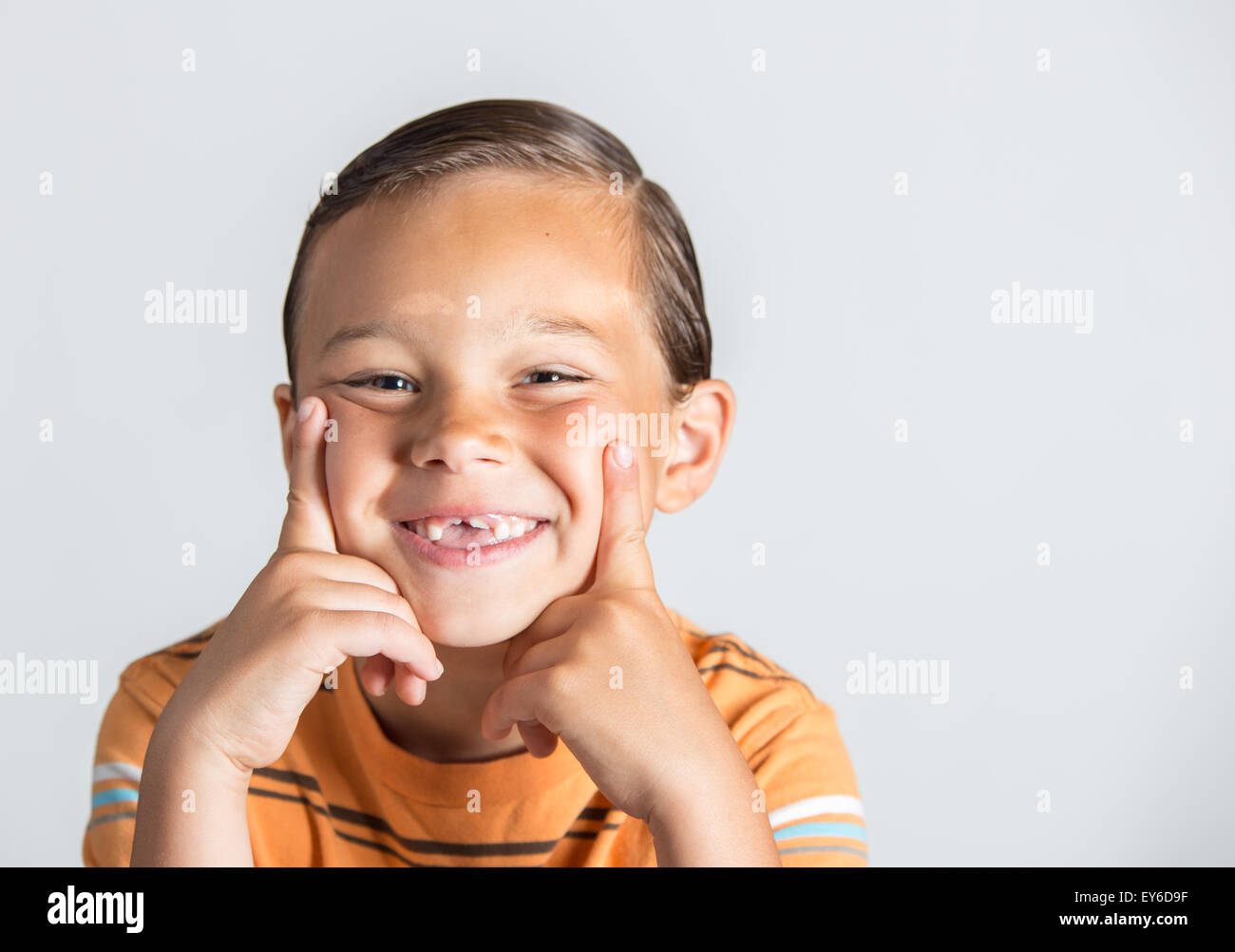 Child smiling and showing lost baby teeth Stock Photo - Alamy