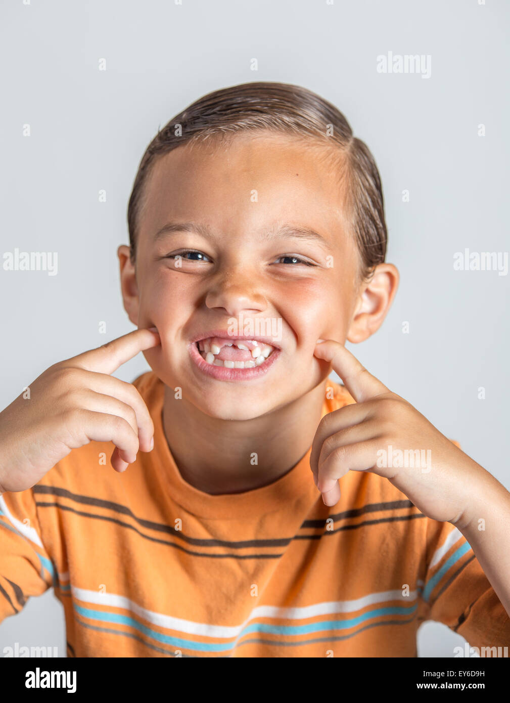 Child smiling and showing lost baby teeth Stock Photo - Alamy