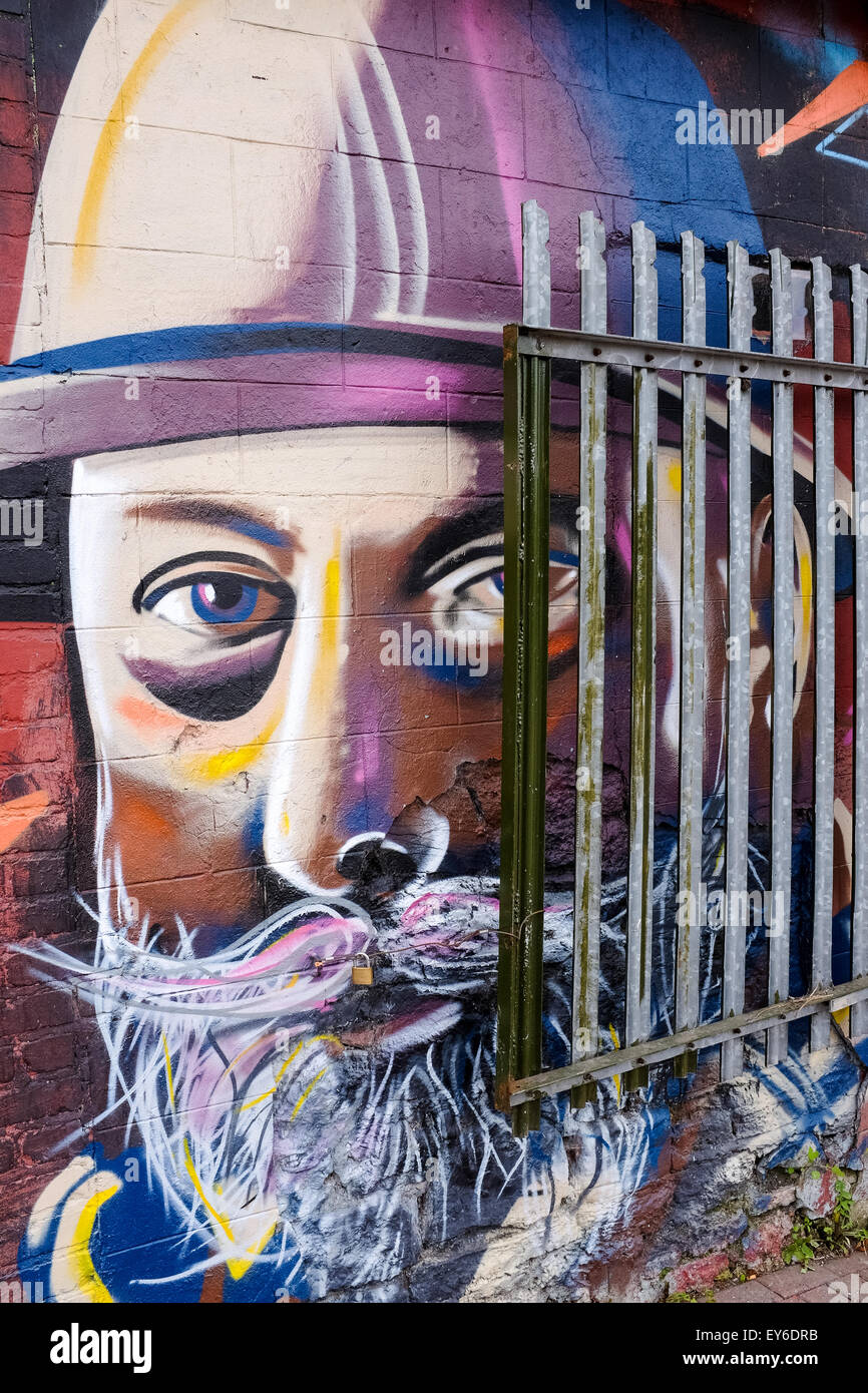 An upright (vertical) image of graffiti art on a wall in Sunderland, UK ...