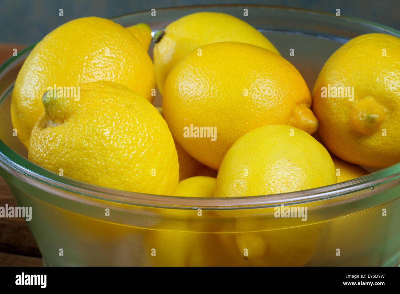 Lemons in a glass plate close up Stock Photo - Alamy
