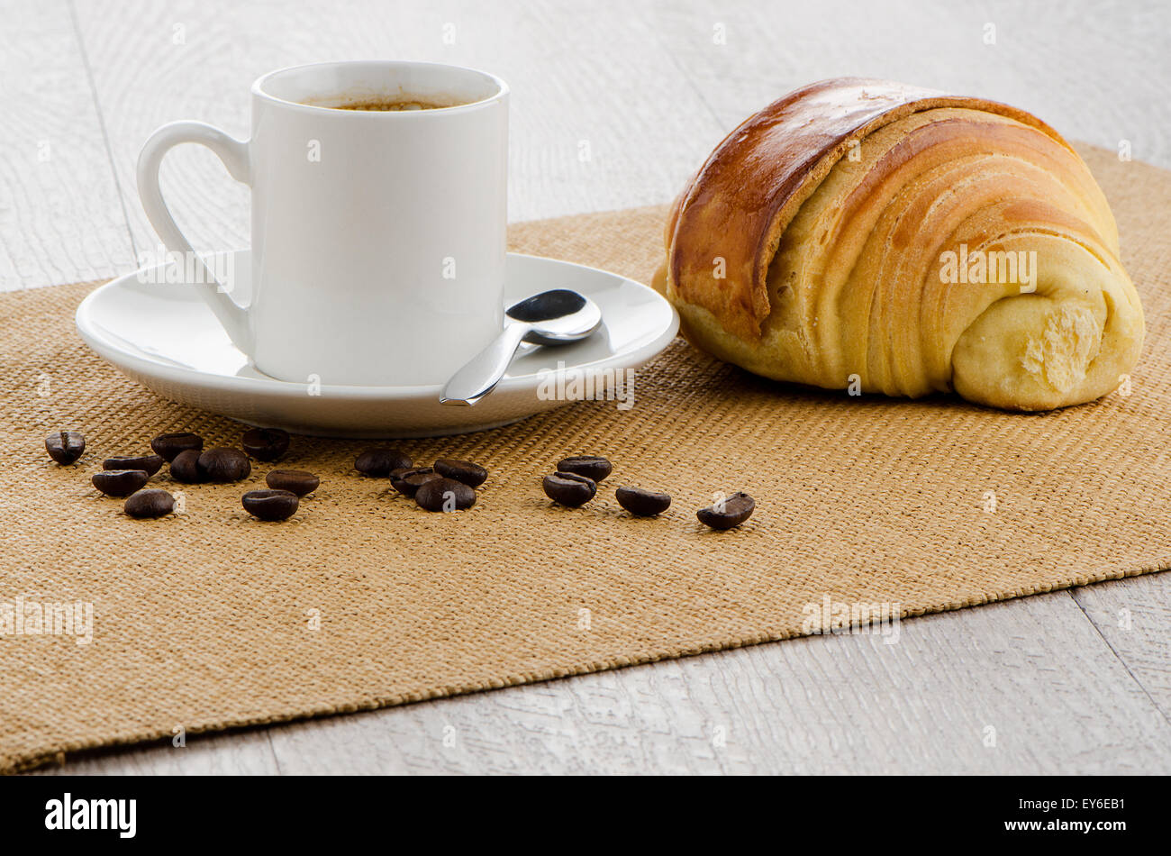 Cup of black coffee over sackcloth baclground Stock Photo - Alamy