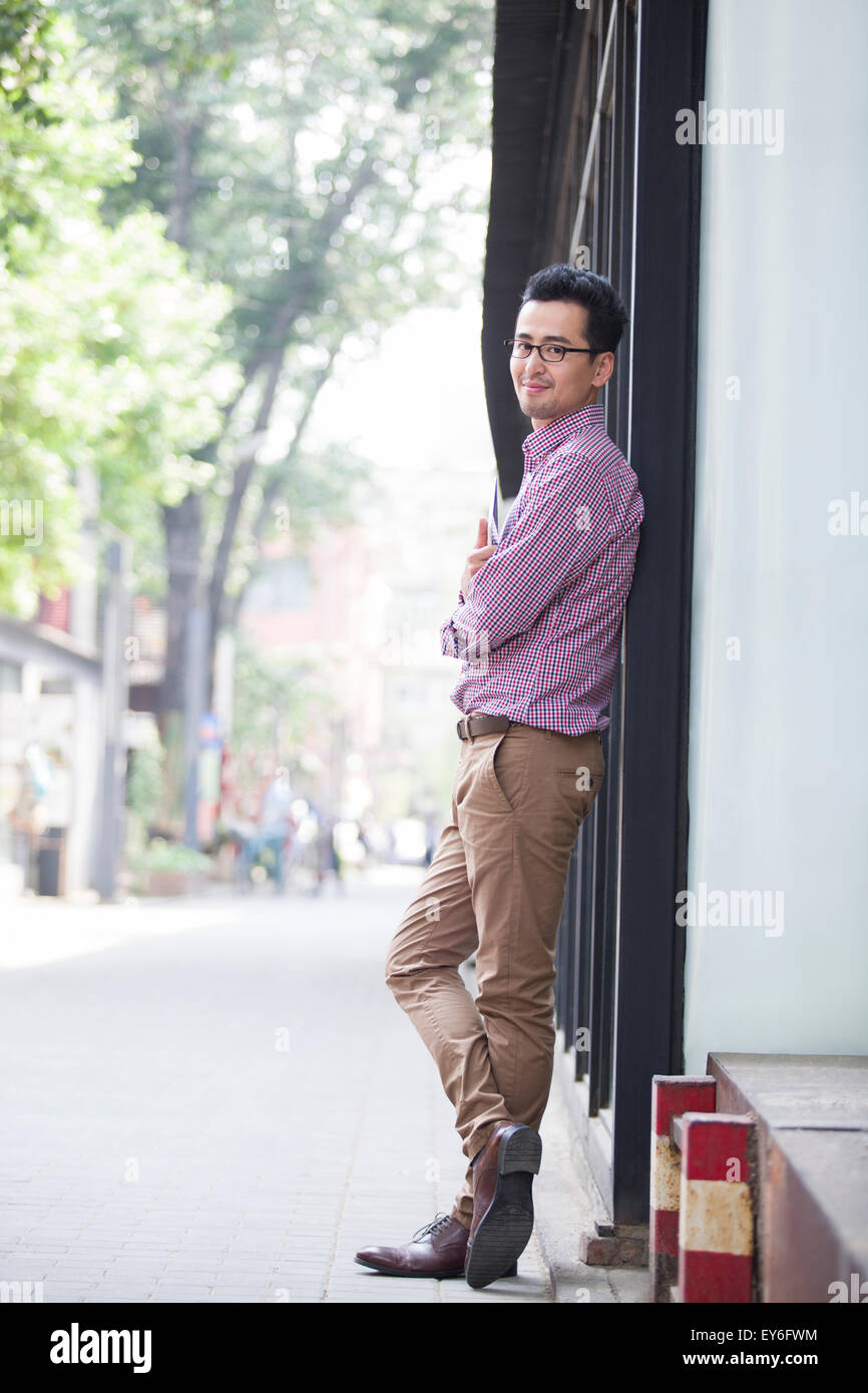Happy mid adult man Stock Photo - Alamy