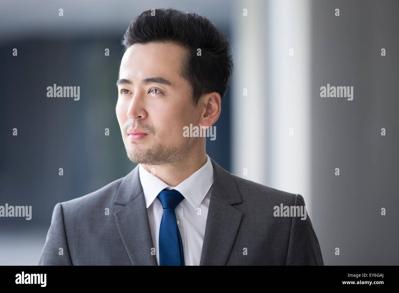 Standing looking away authority serious hi-res stock photography and ...