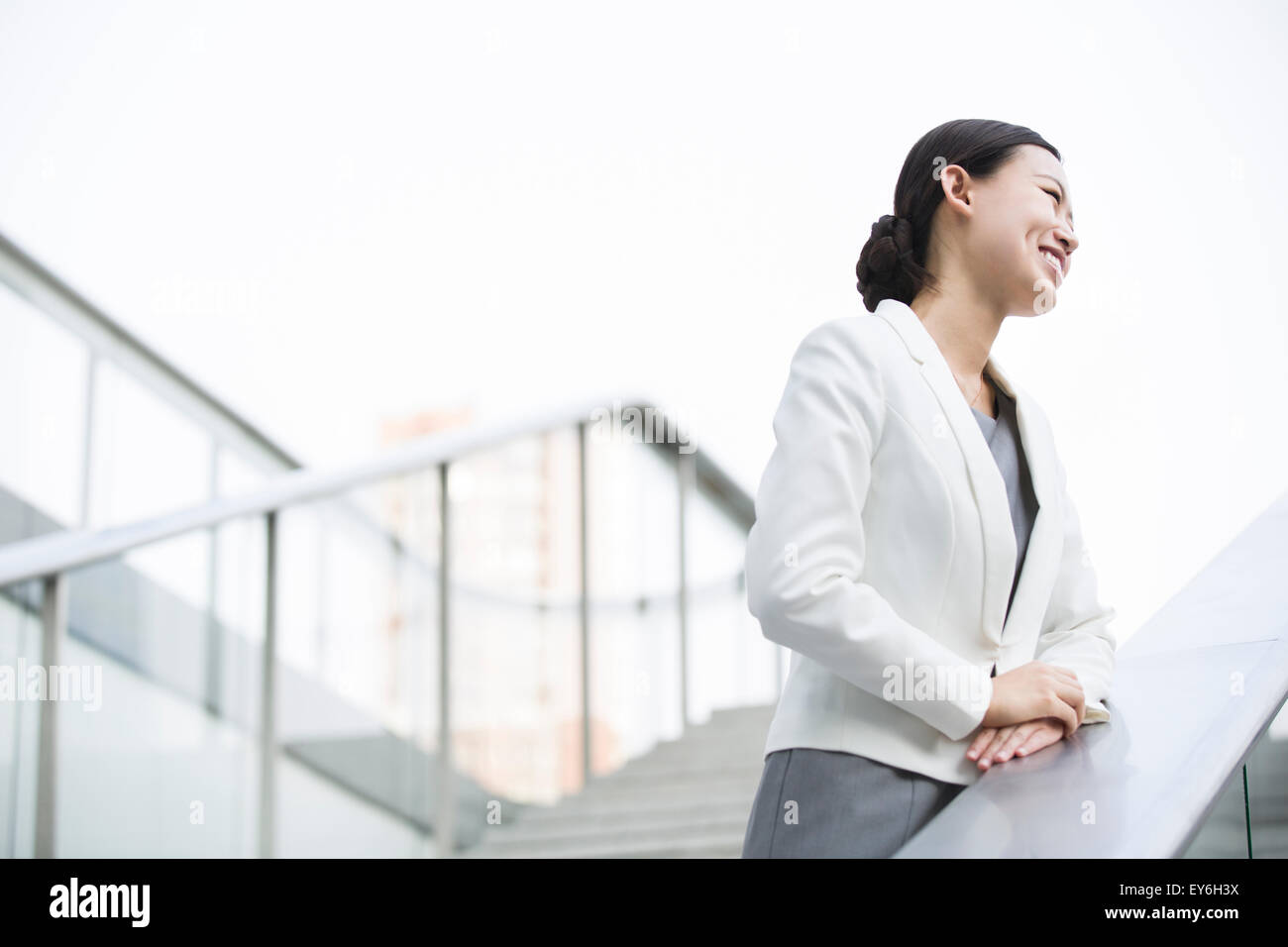 Three women standing on stairs hi-res stock photography and images - Alamy