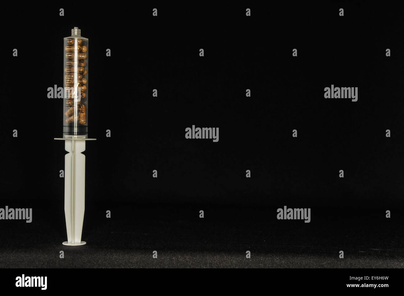 medical syringe on a drugs Stock Photo - Alamy