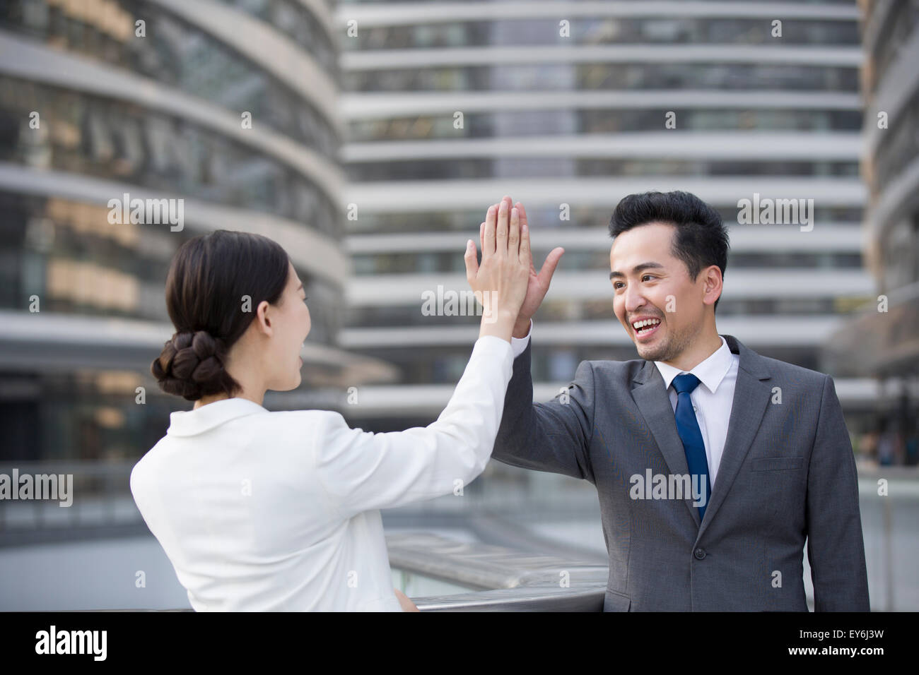 Businessman laughing office railing hi-res stock photography and images ...