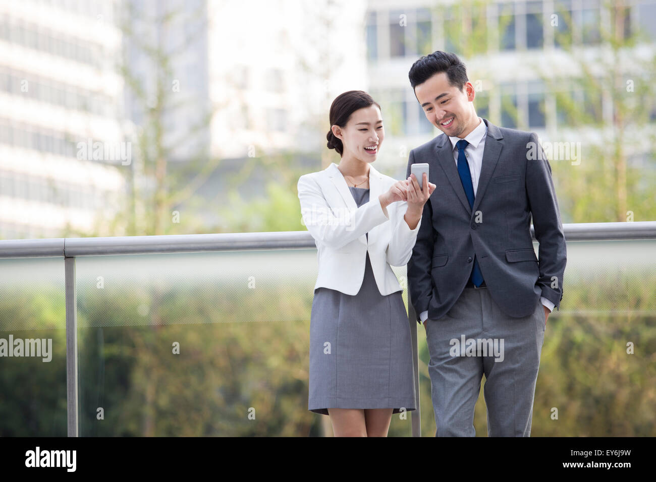 Business person using smart phone Stock Photo - Alamy