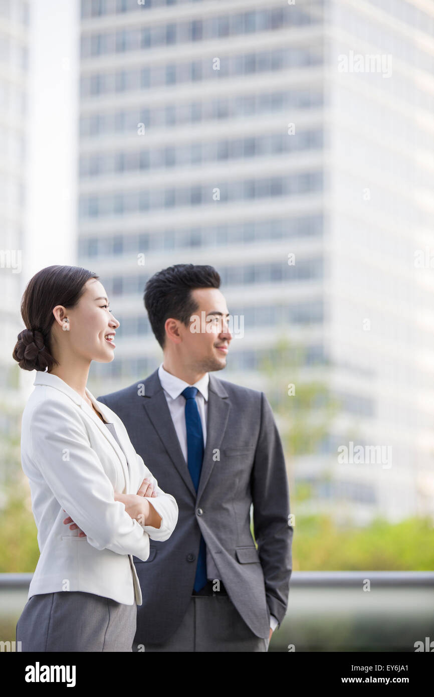 Business person looking at view Stock Photo - Alamy