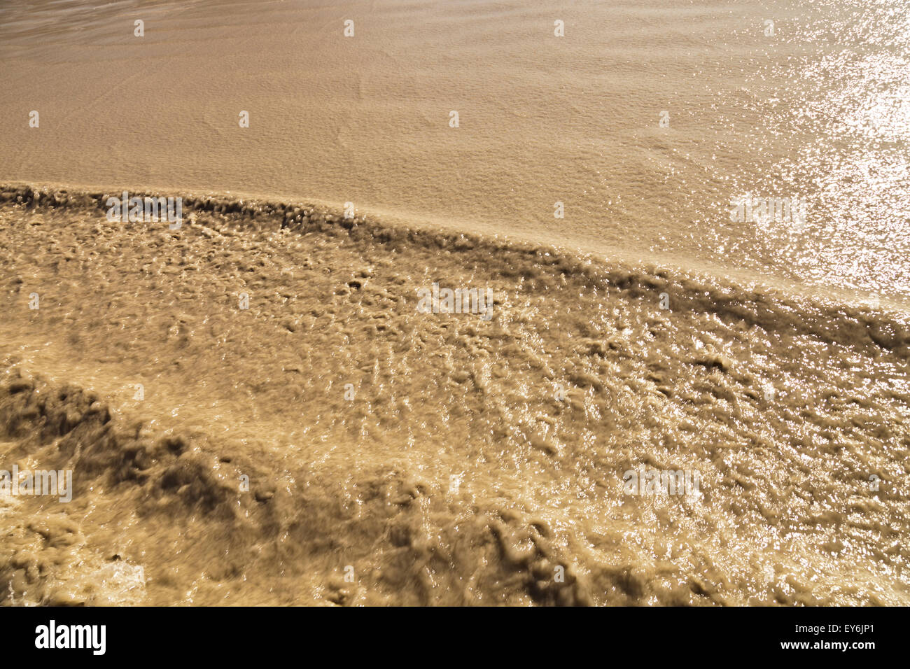 Waves and ripples on a beach in South Africa Stock Photo - Alamy