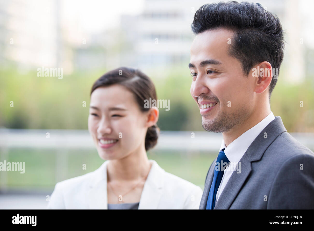 Business person looking at view Stock Photo - Alamy