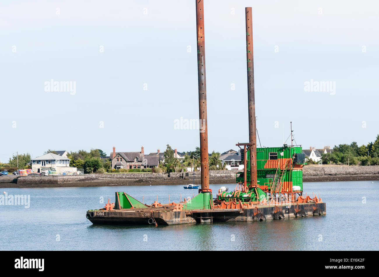 A floating barge for construction works at a harbour Stock Photo - Alamy