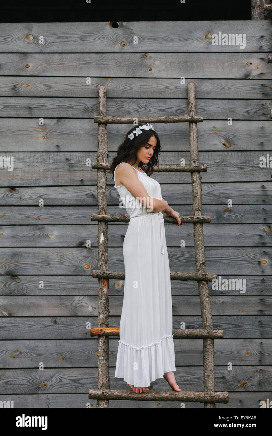 Girl up ladder tree hi-res stock photography and images - Alamy