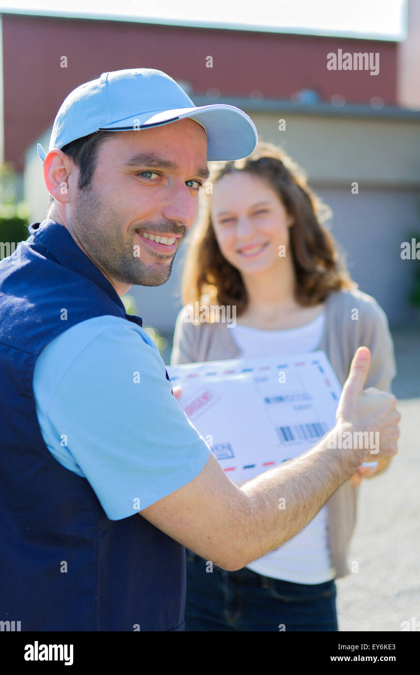 Man handing letter woman in hi-res stock photography and images - Alamy