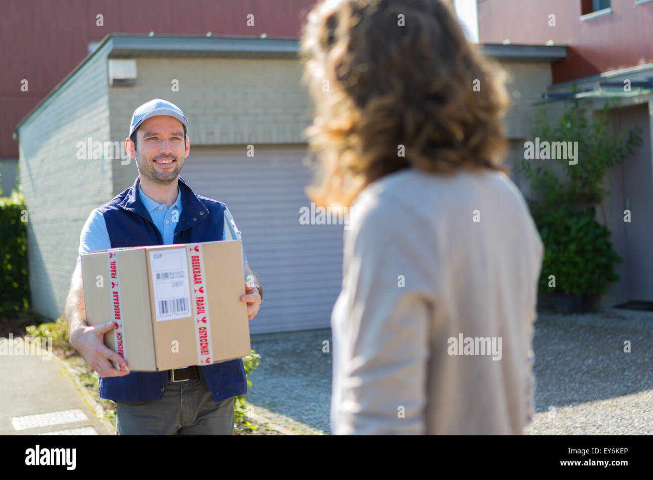 Customer waiting for parcel delivery hi-res stock photography and ...