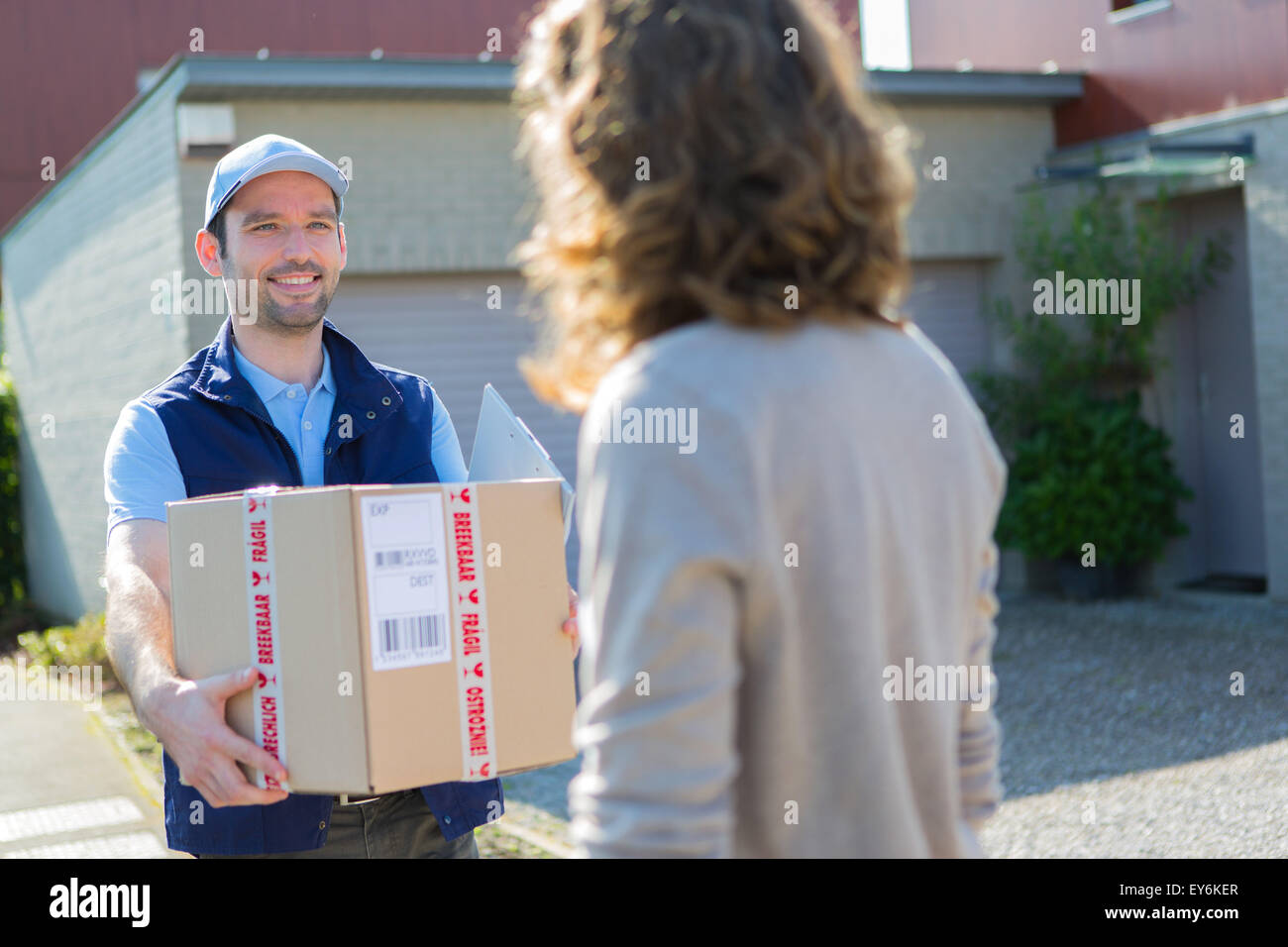 Customer waiting for parcel delivery hi-res stock photography and ...