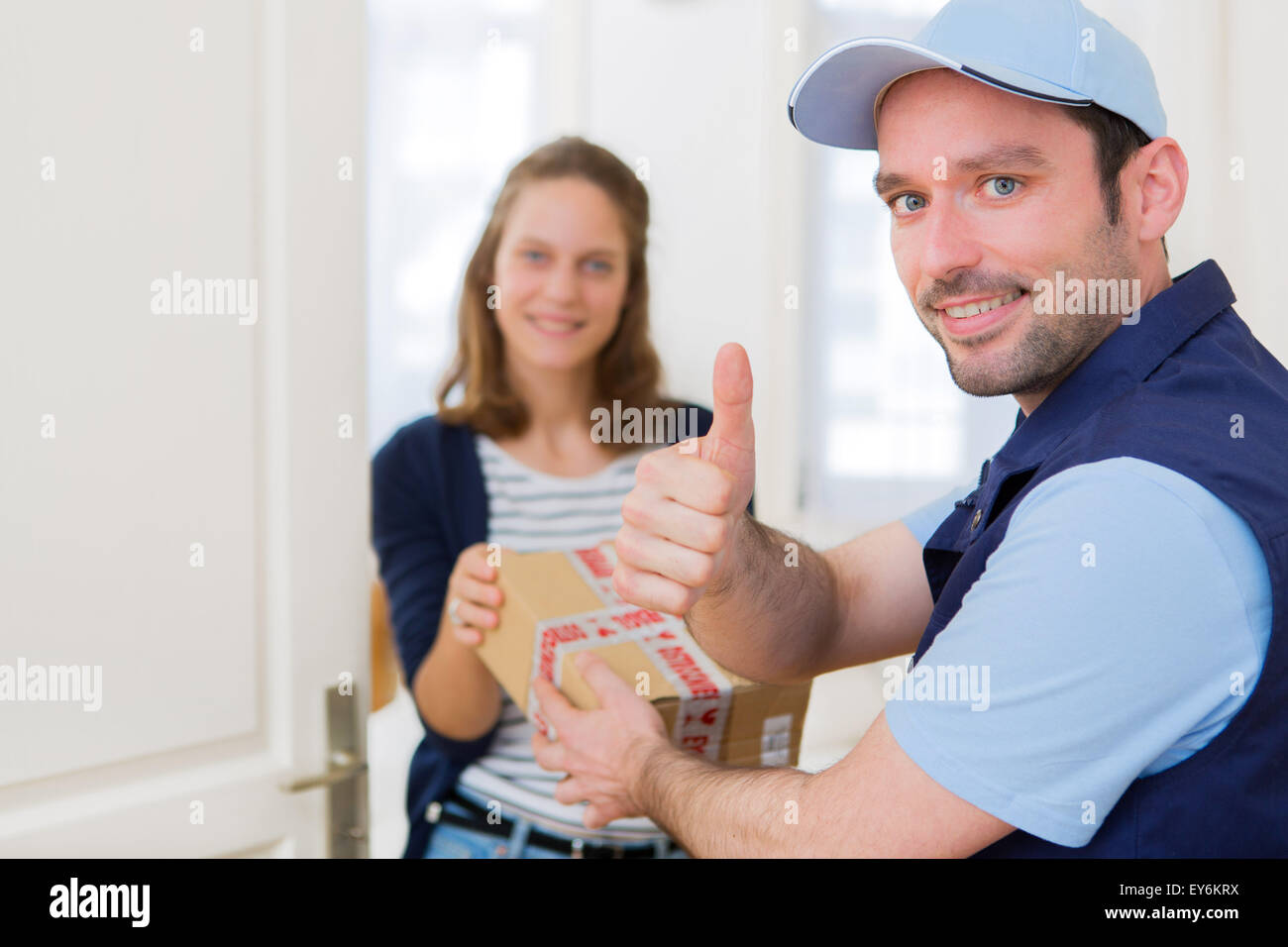 Handing a parcel over hi-res stock photography and images - Alamy
