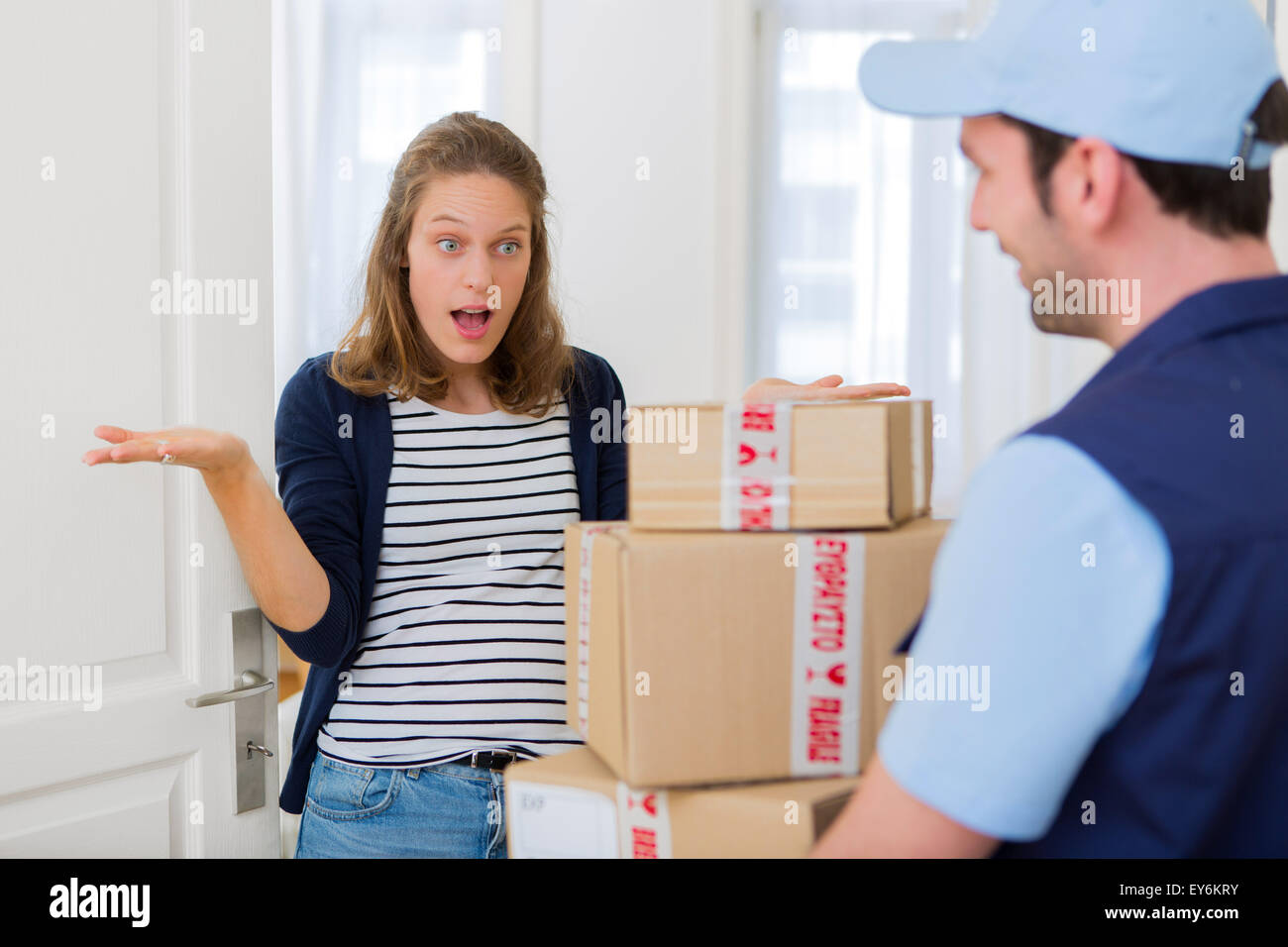 Handing a parcel over hi-res stock photography and images - Alamy