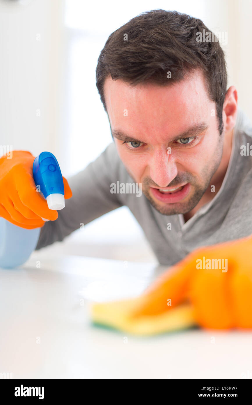 Attractive young man cleaning hi-res stock photography and images - Alamy