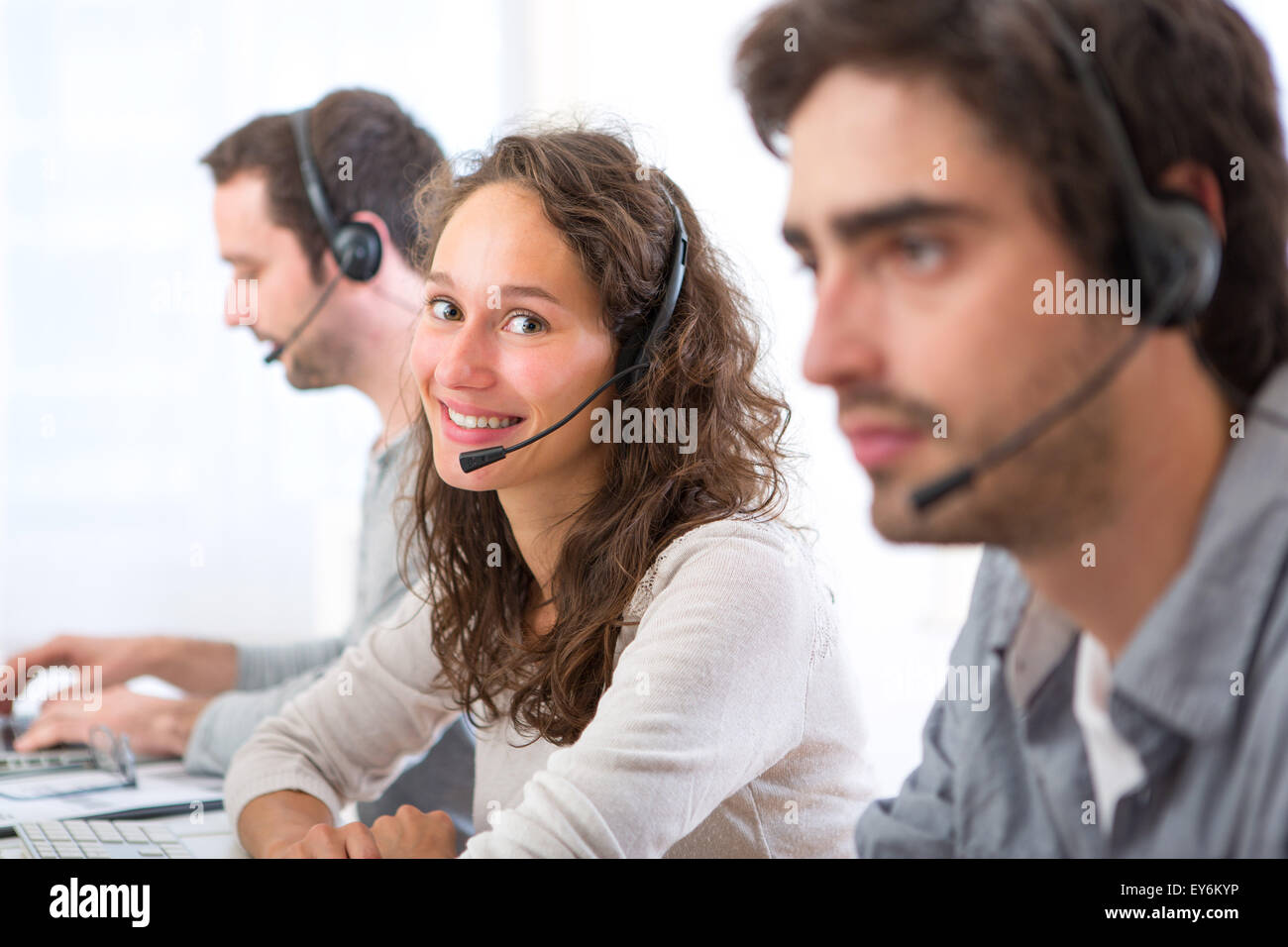 View of a Young attractive woman working in a call center Stock Photo ...