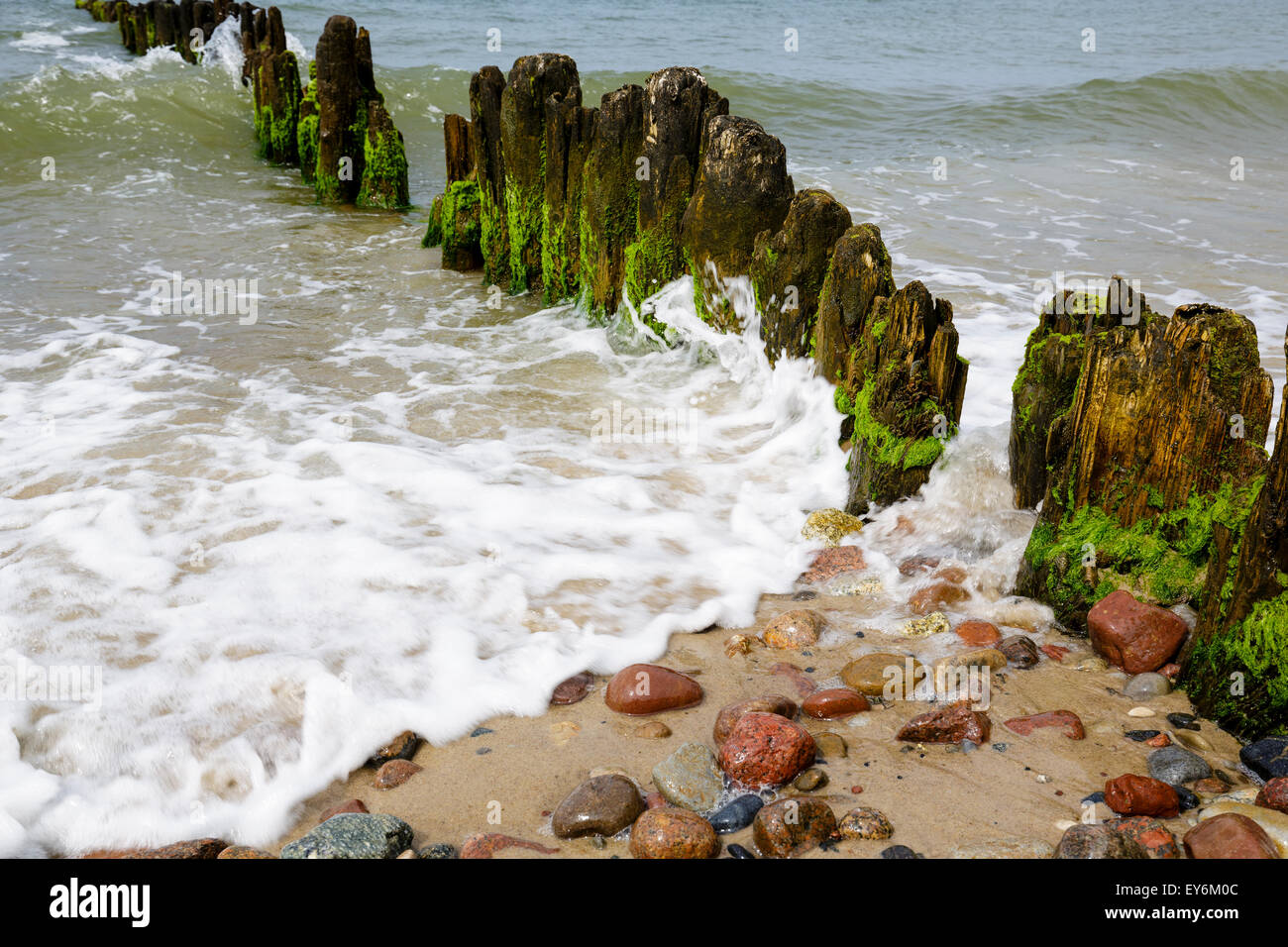 old and rotten wooden breakwaters Stock Photo - Alamy