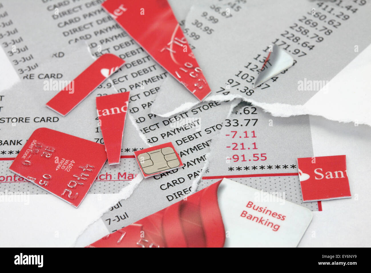 Torn Bank statements and cut up Credit Cards Stock Photo - Alamy