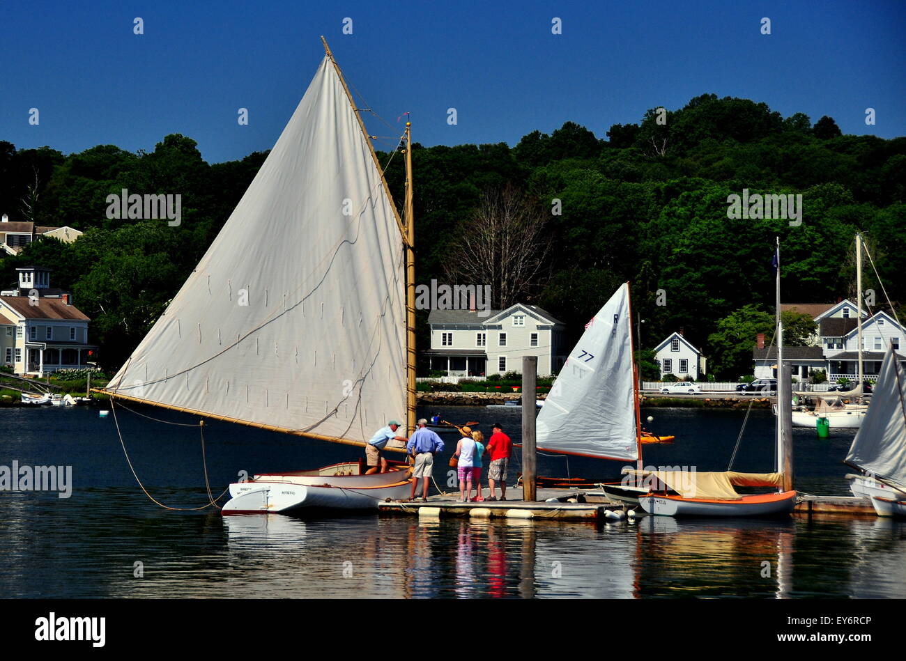 Mystic, Connecticut: Family prepares to board a sailing ship for a ride ...