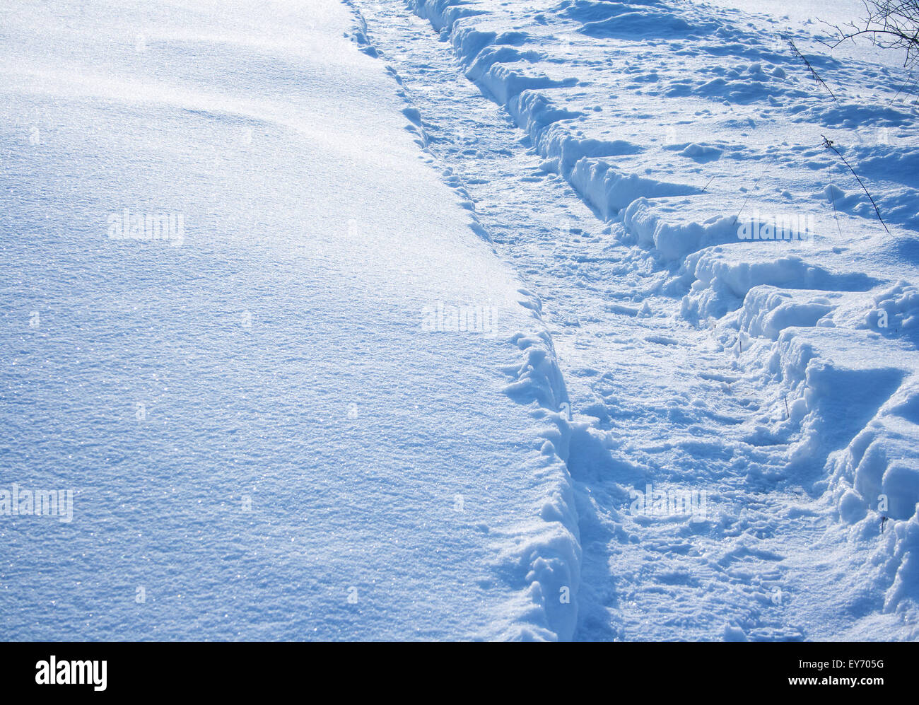 Path on the snow Stock Photo - Alamy