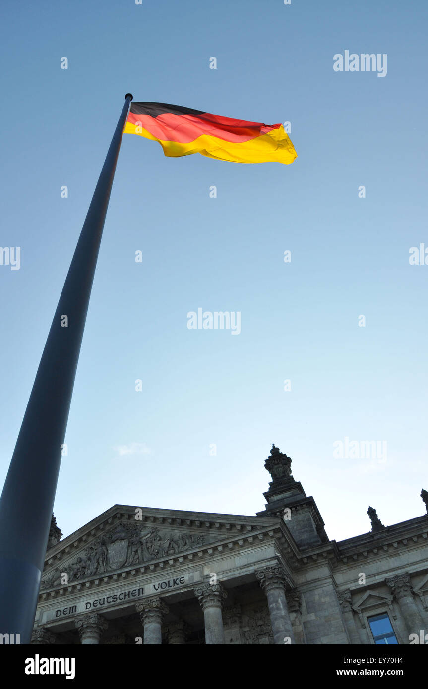 German flag reichstag flying hi-res stock photography and images - Alamy
