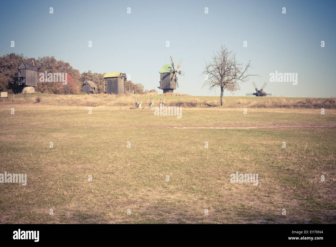 Countryside view with old windmill Stock Photo - Alamy