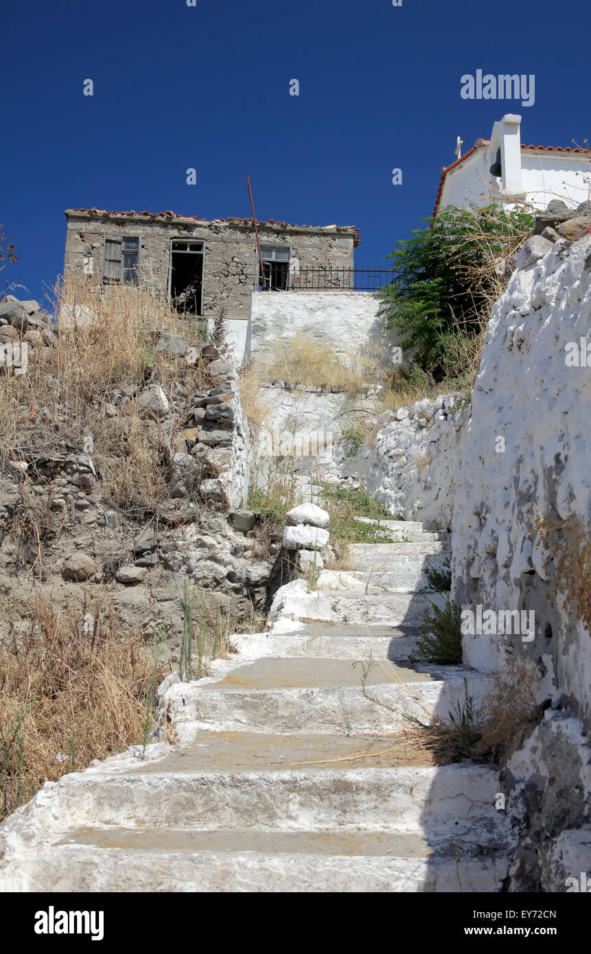 Old ruins of a traditional stone wall house in Agios Efstratios hamlet ...