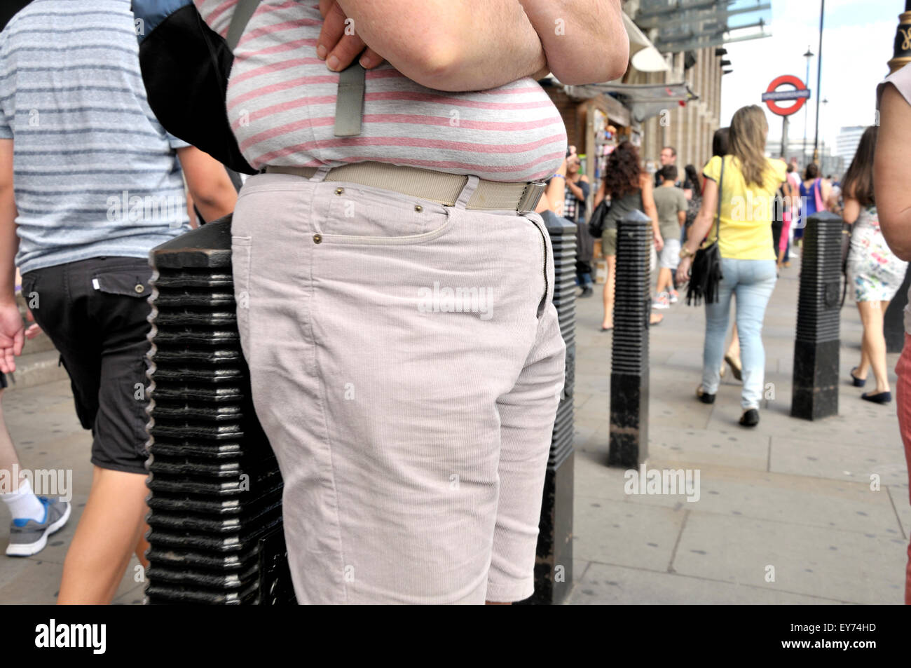 London, England, UK. Overweight man standing by the road Stock Photo ...