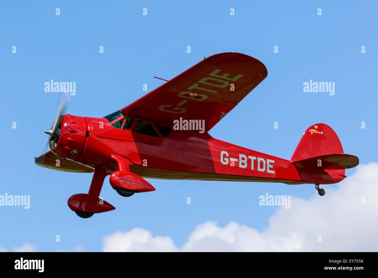 Cessna 165 Airmaster, reg. G-BTDE, in flight at Breighton Stock Photo ...