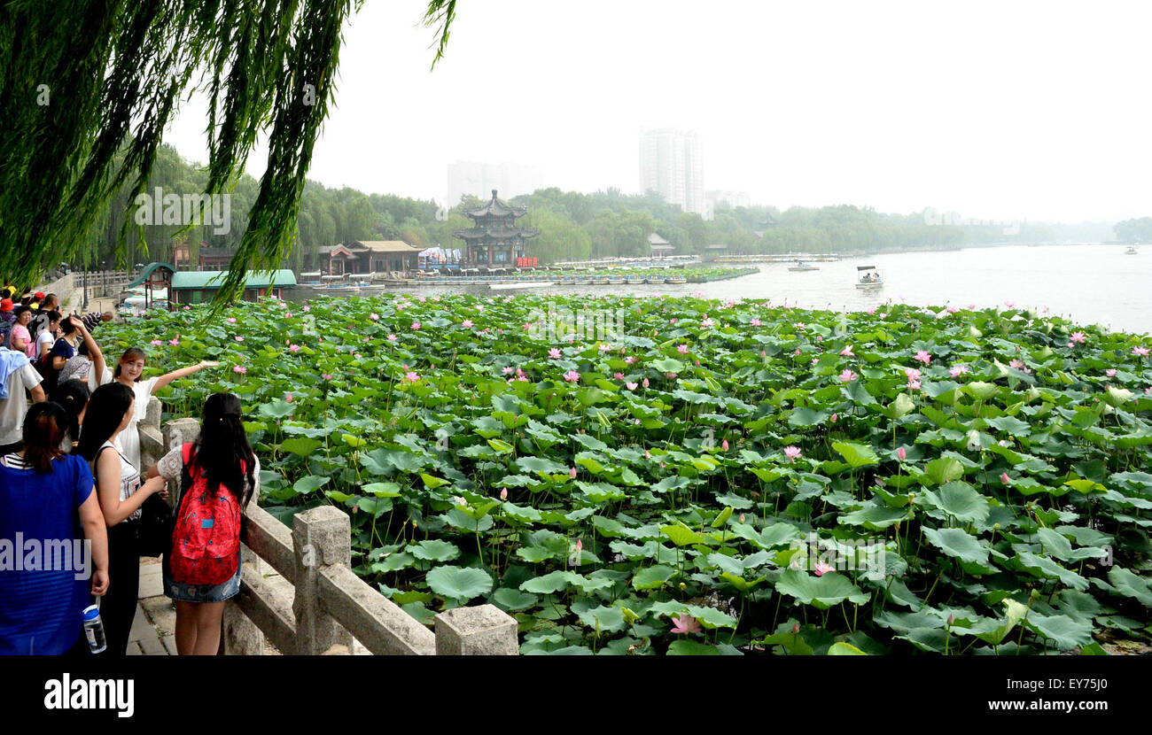 Jinan, China's Shandong Province. 23rd July, 2015. People view red ...