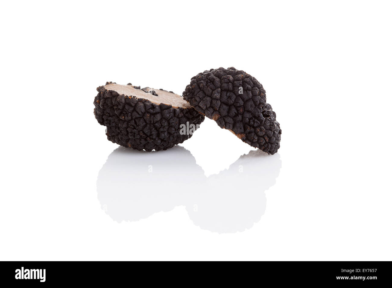 Cut truffles isolated on white background. Luxurious culinary cooking ...