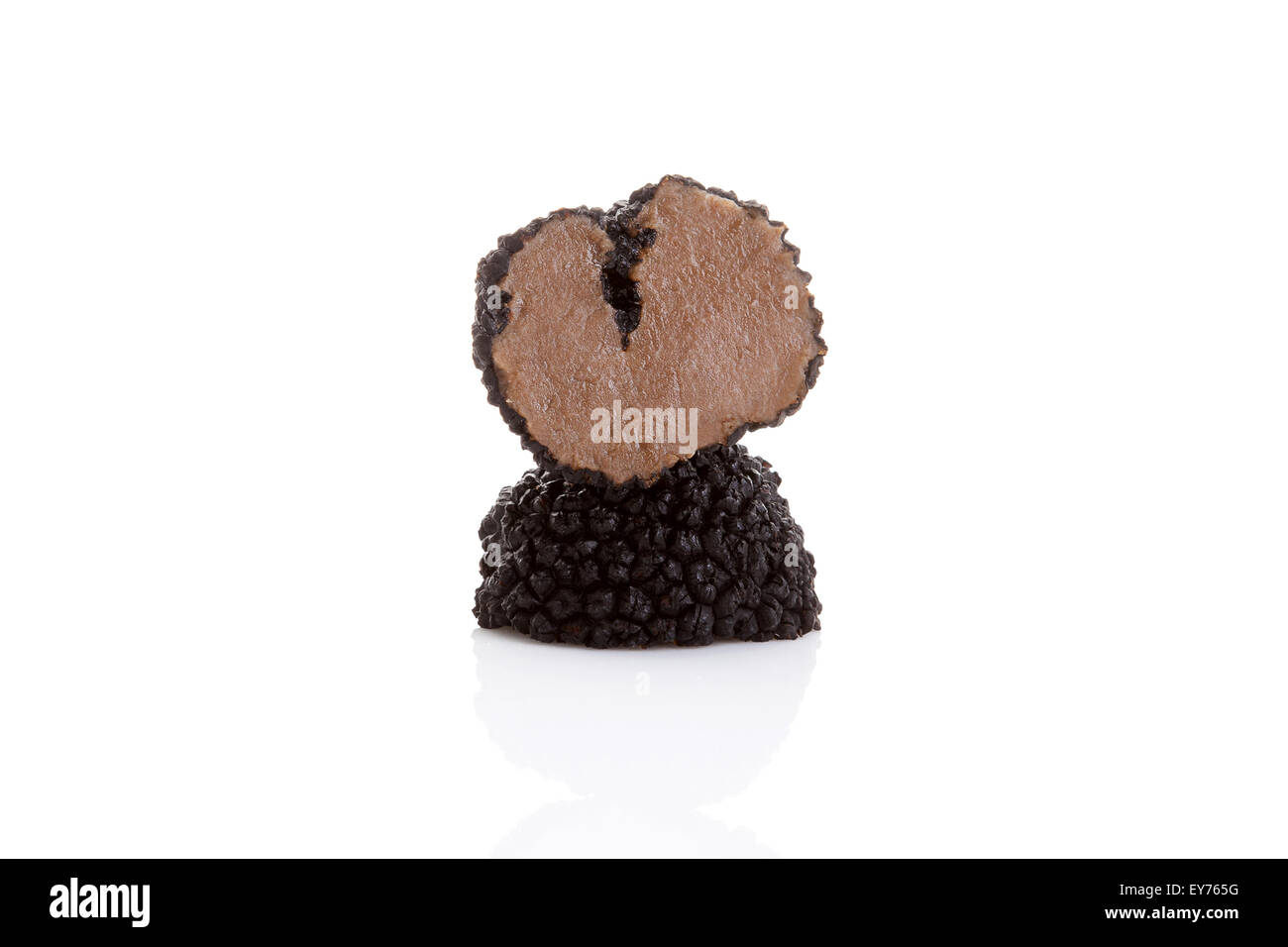 Cut truffles isolated on white background. Luxurious culinary cooking ...