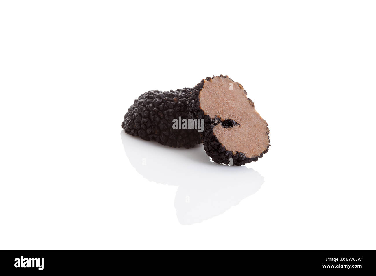 Cut truffles isolated on white background. Luxurious culinary cooking ...