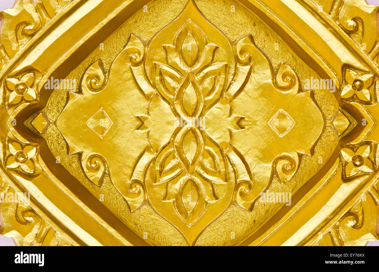 Native art carved on the wall in the temple Stock Photo - Alamy