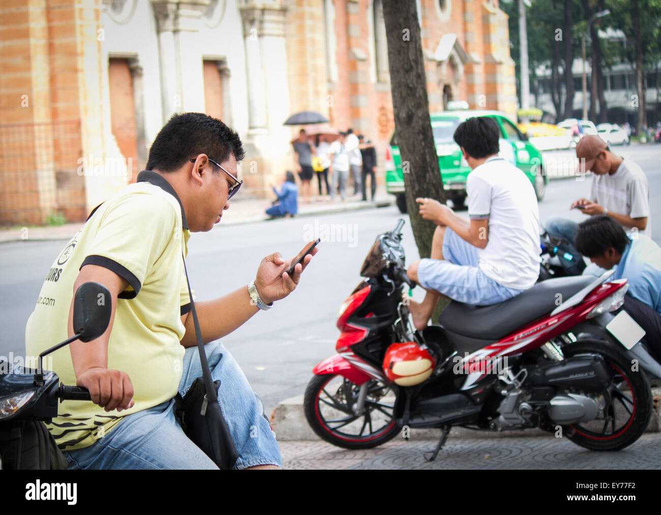 Ho Chi Minh City, Vietnam. 23rd July, 2015. Vietnamese youths use ...